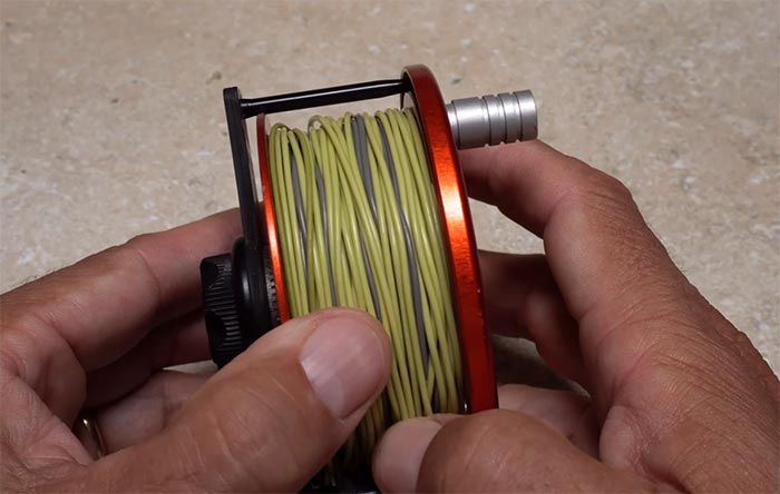 Video: How to Set Up a Fly Reel - Fishing Fly Tackle